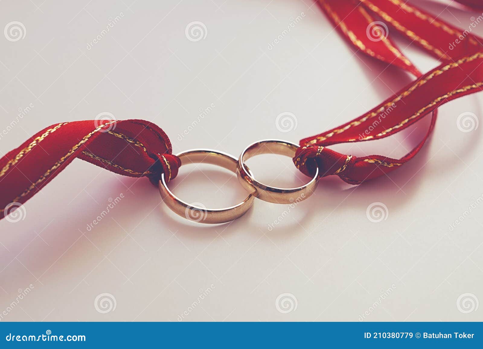 Wedding Rings and Red Ribbon on White Background Stock Image - Image of ...