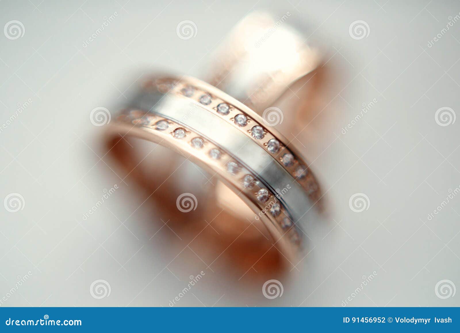 The Wedding Rings Stand on the Table Stock Photo - Image of jewellery ...