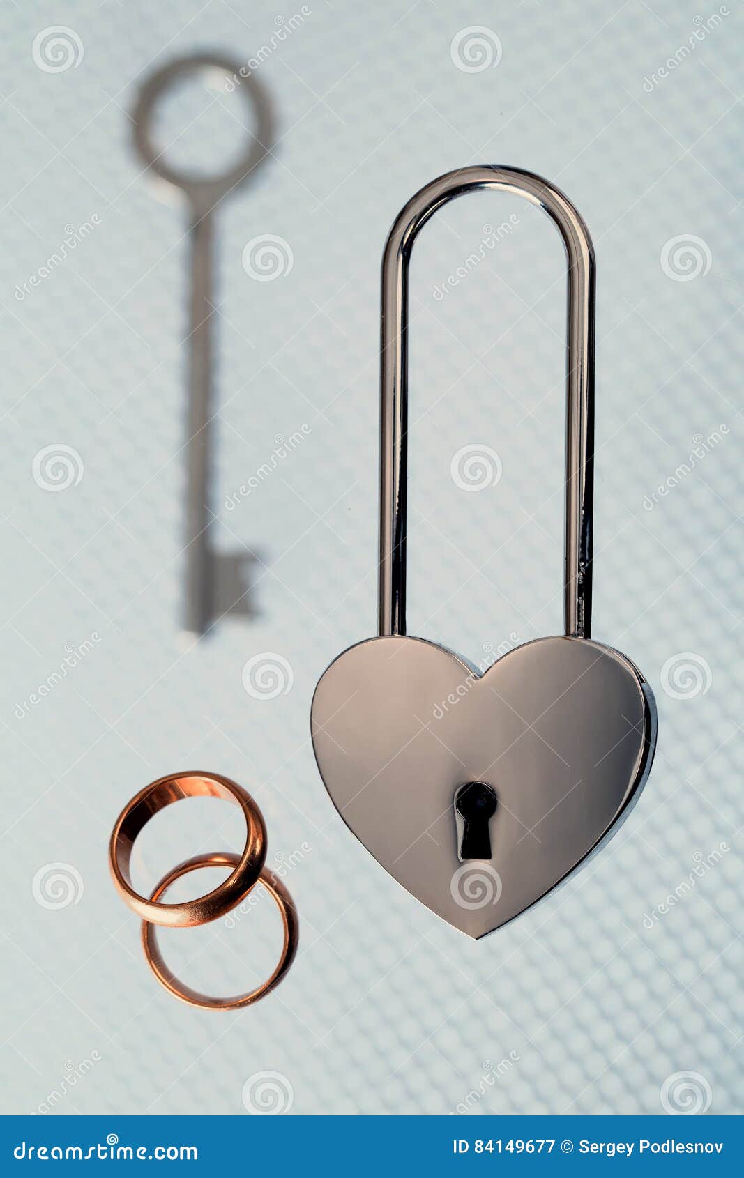 Wedding Rings, Steel Lock and Key on Light Background Stock Image ...