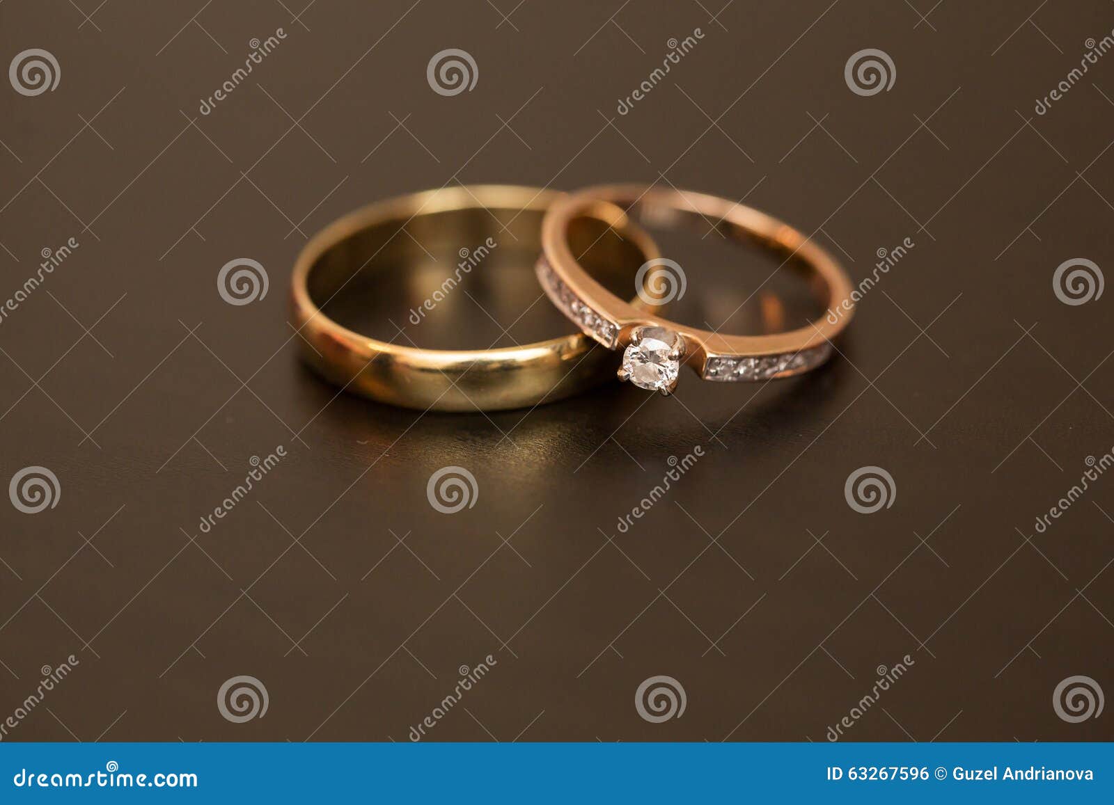 Wedding rings on a table stock photo. Image of diamond - 63267596