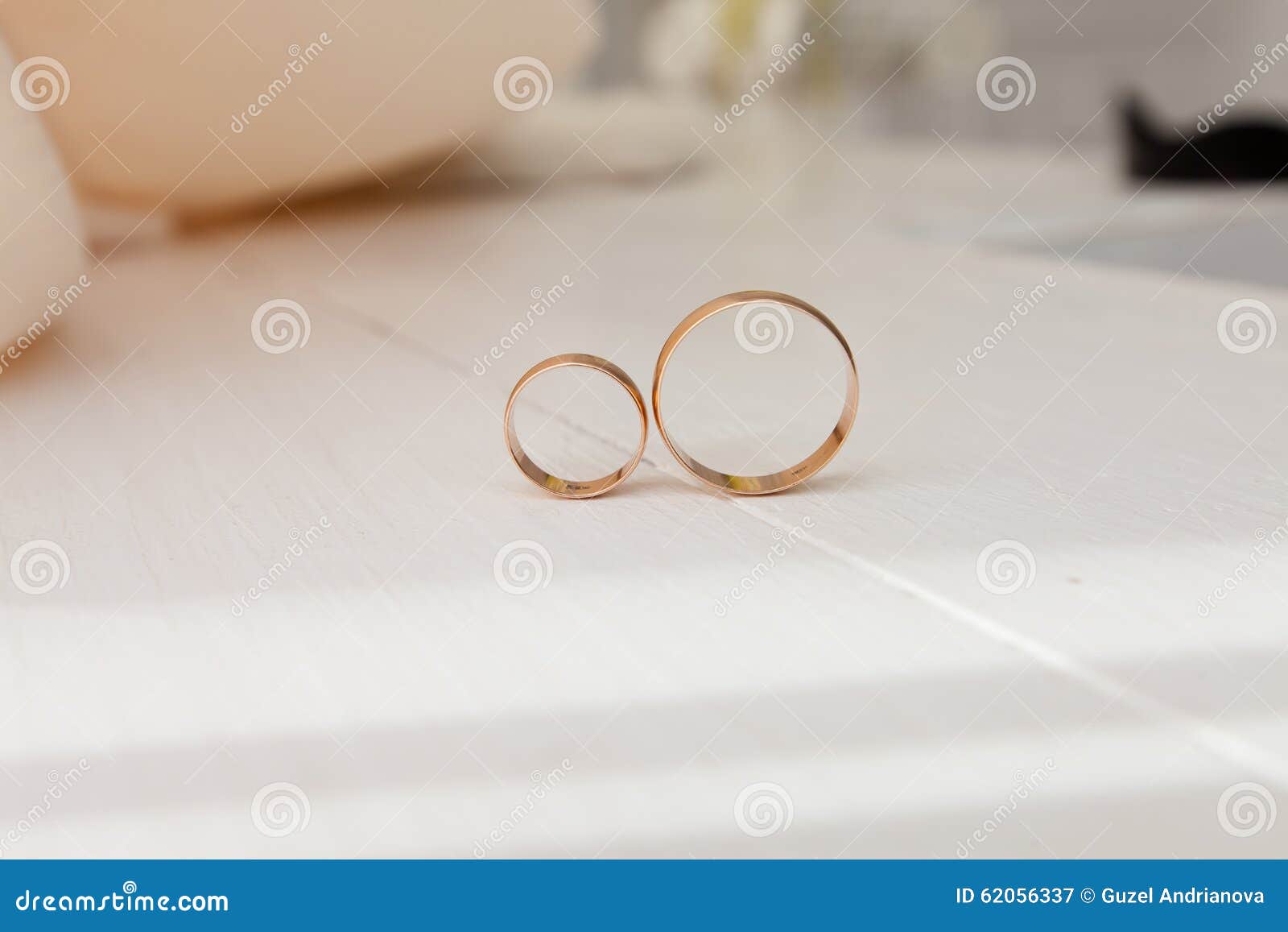 Wedding rings on the table stock image. Image of diamond - 62056337