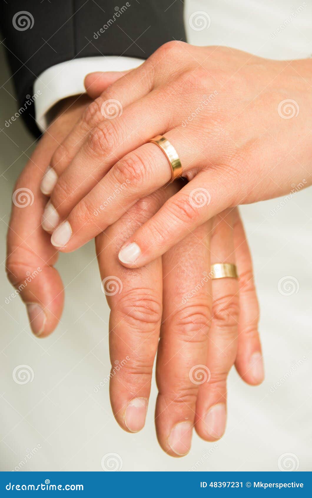 Wedding rings stock image. Image of hands, ring, symbol - 48397231