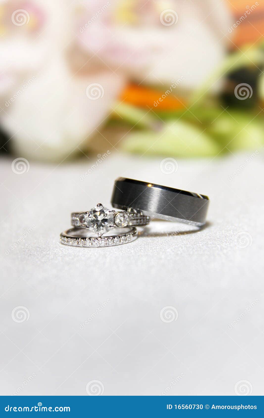Wedding Rings on White Table Stock Photo - Image of diamond, diamonds ...