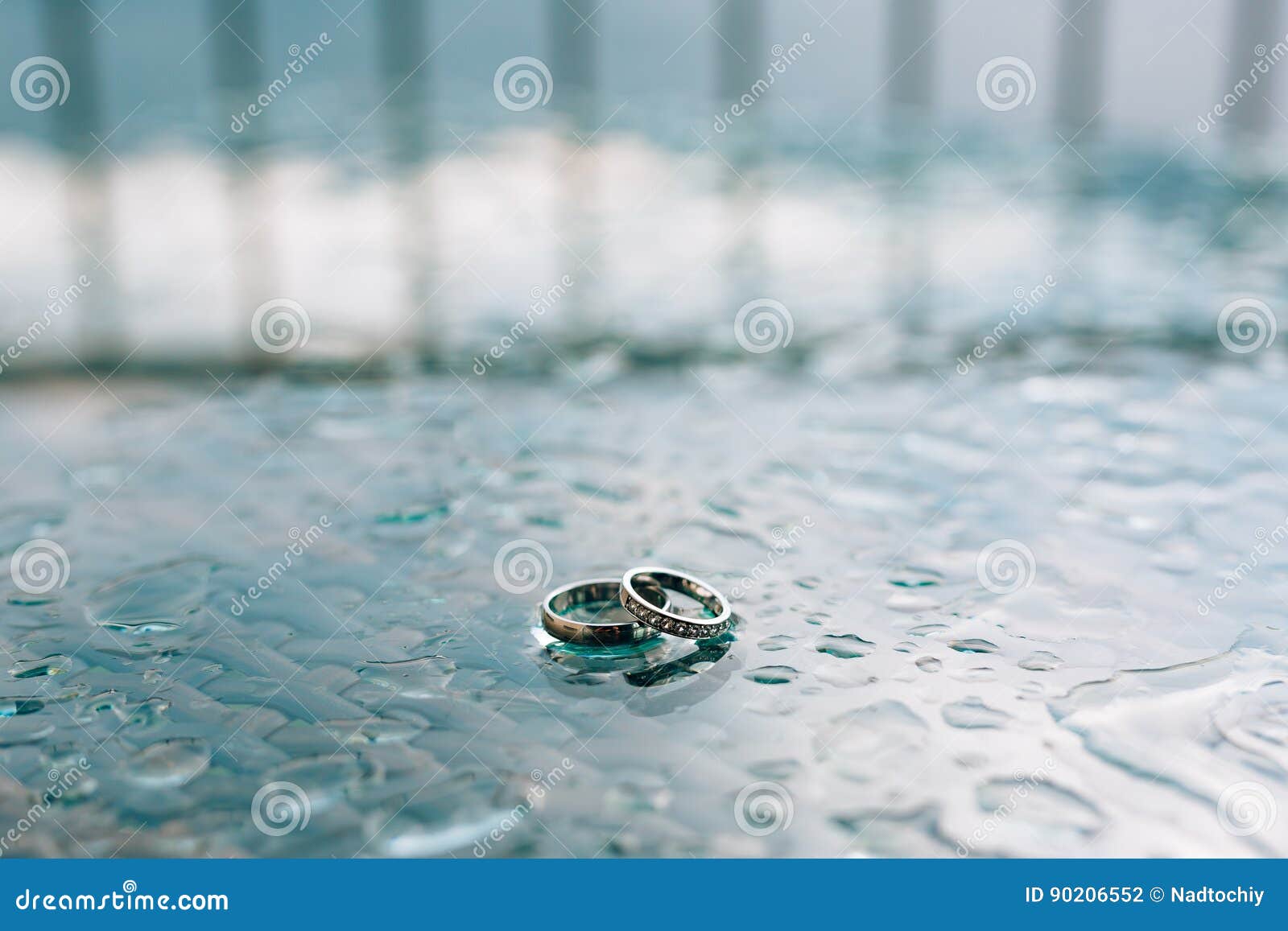 Wedding Rings on the Window in the Rain. Drops on the Glass Stock Photo ...