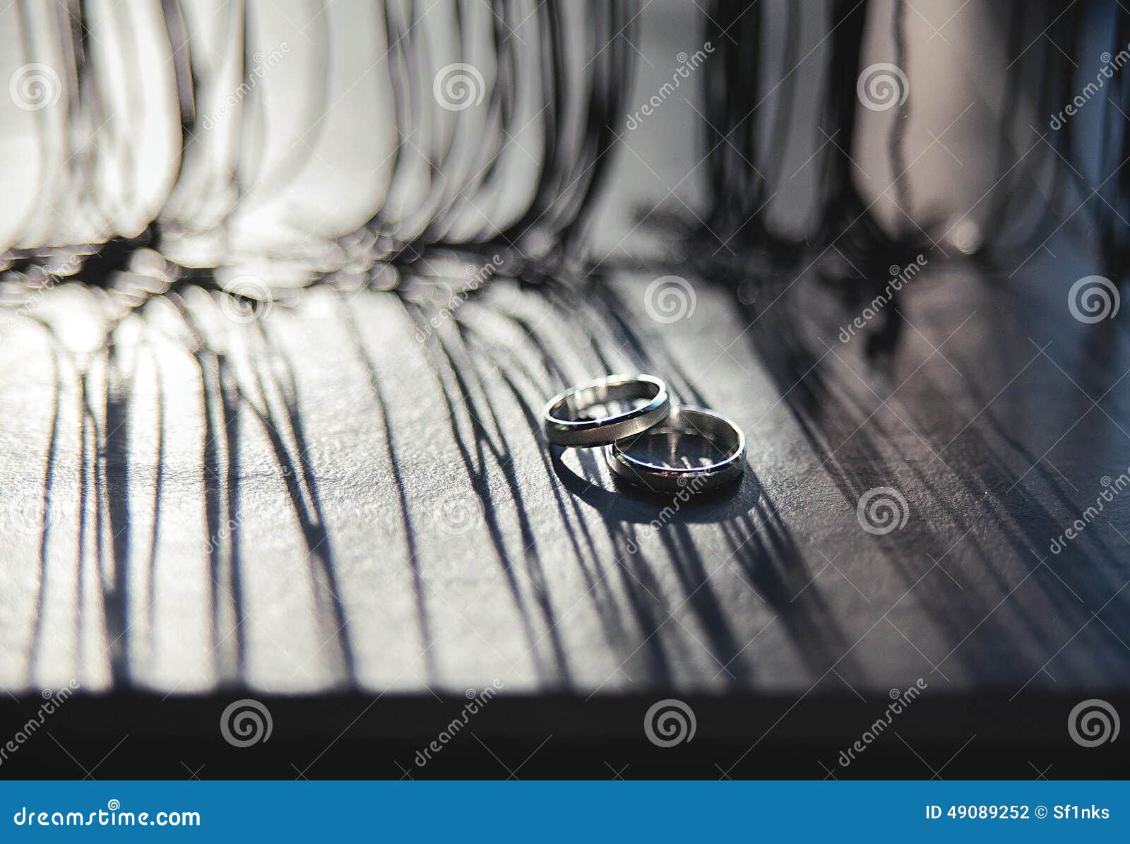 Wedding Rings on a Wooden Board Stock Photo - Image of emotions ...