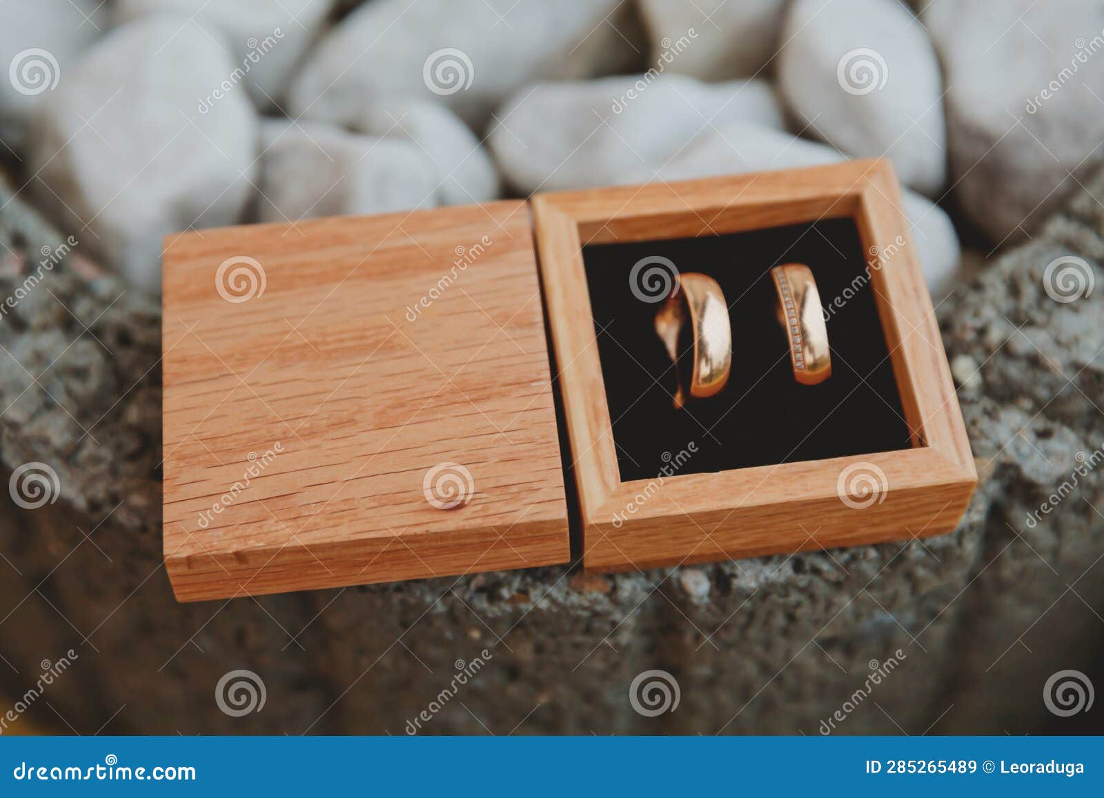 Wedding Rings in a Wooden Box on Stone in Nature. Soft Focus Stock ...