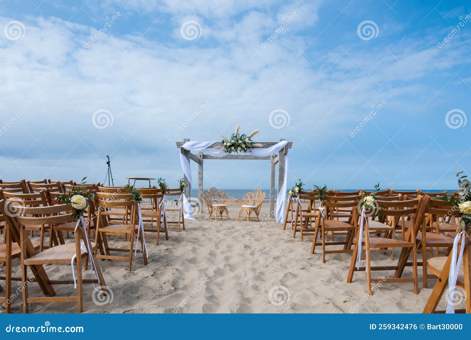 A Wedding Setting on a Beach Stock Photo - Image of arbor, flowers ...