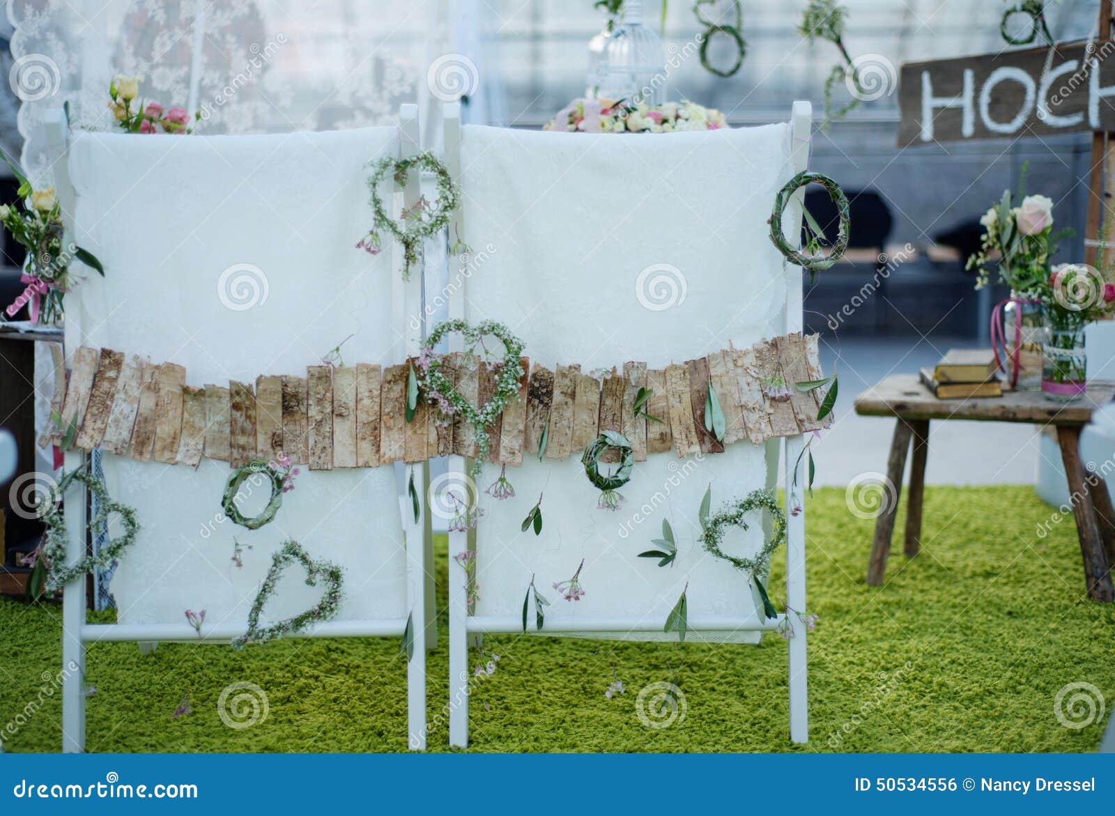 Wedding stools from behind stock photo. Image of caterer - 50534556