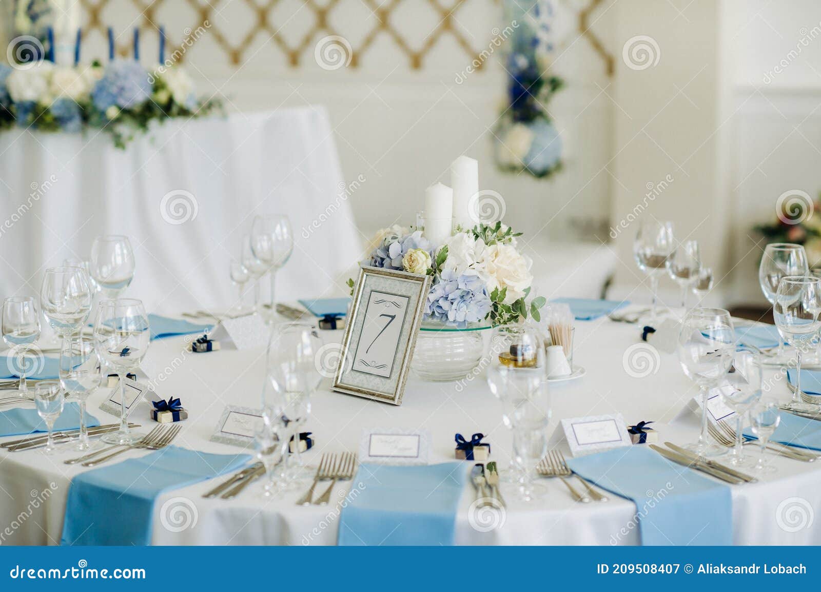Wedding Table Decoration with Blue Flowers on the Table in the ...