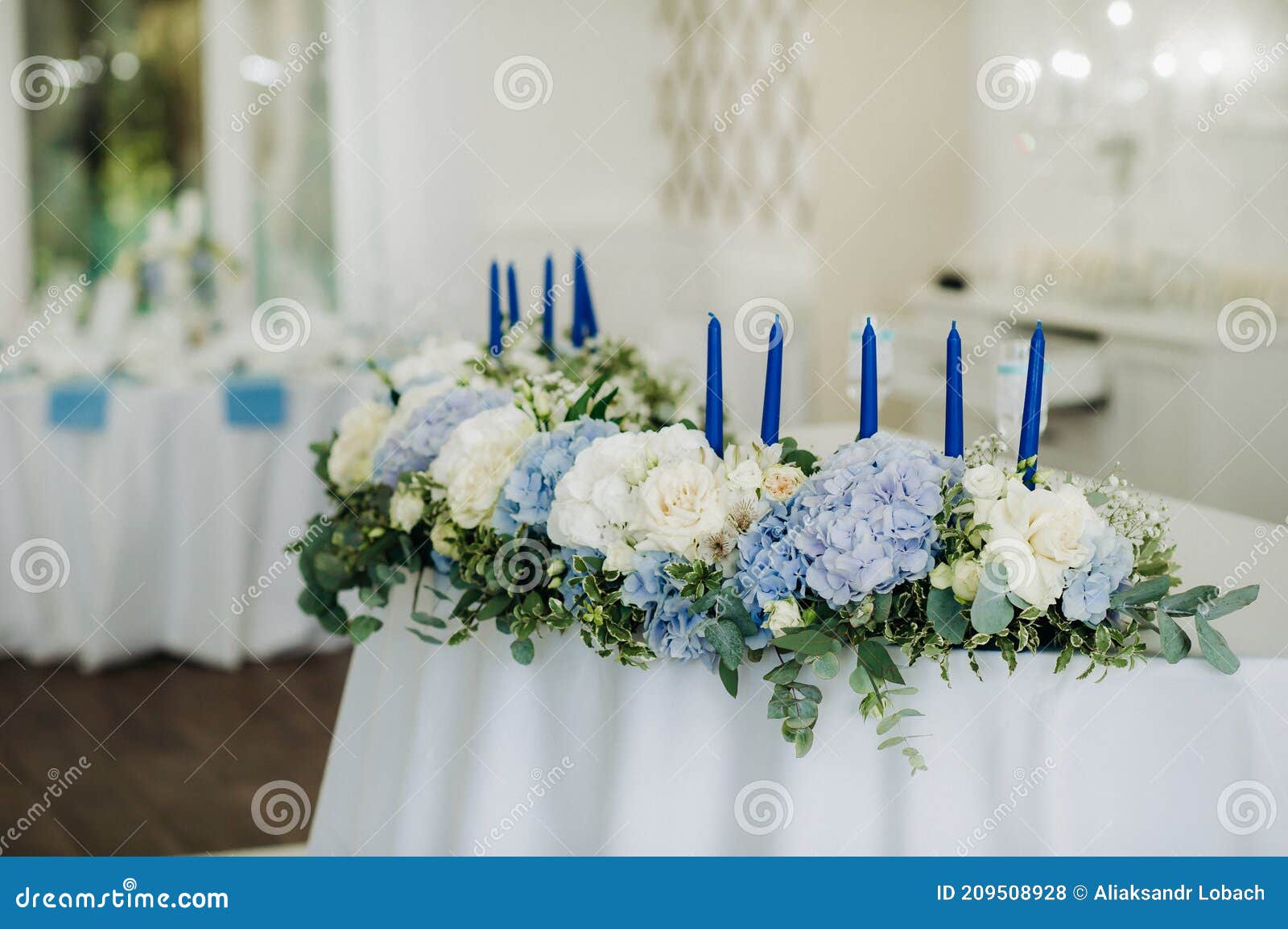 Wedding Table Decoration with Blue Flowers on the Table in the ...