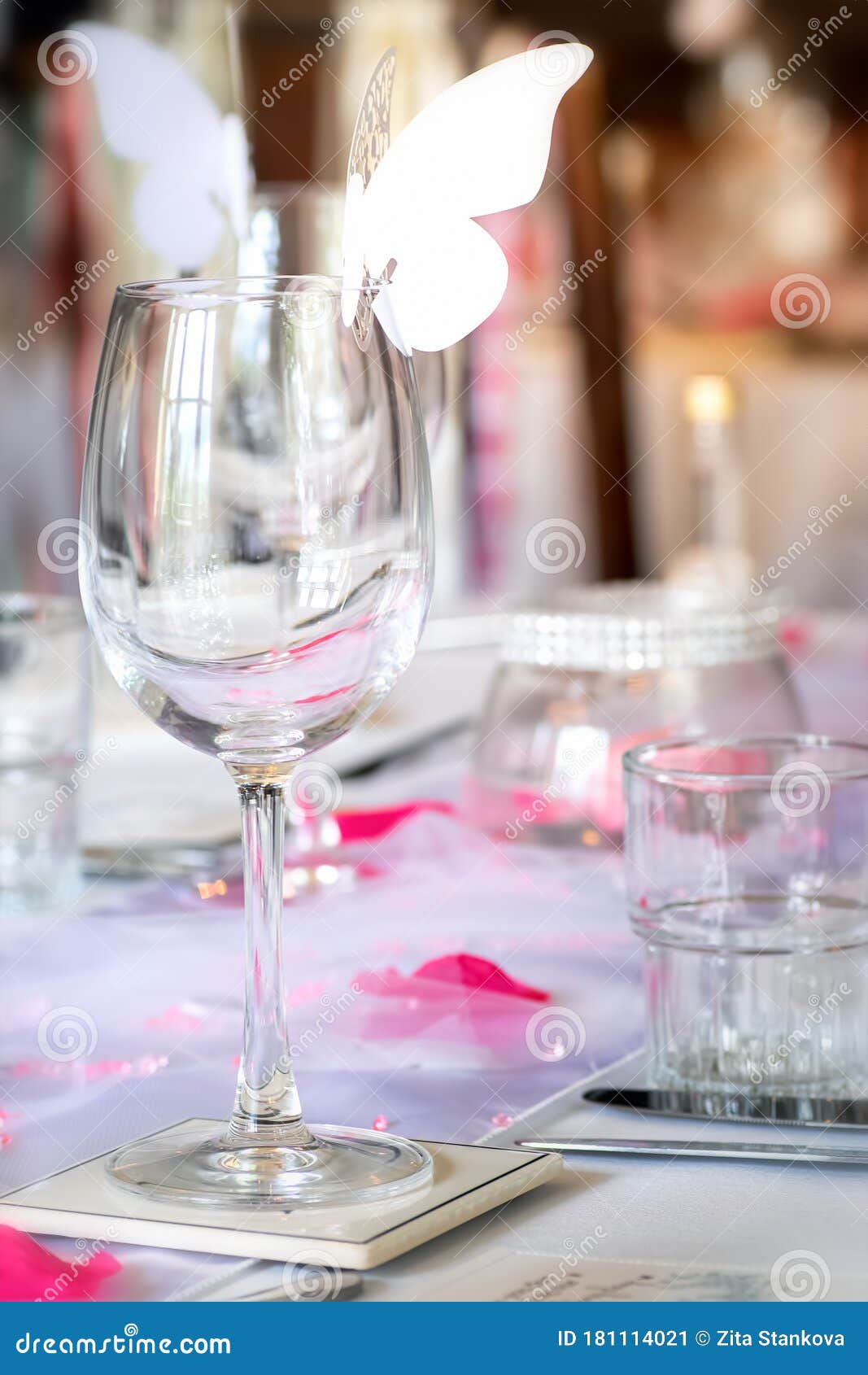 Wedding Table Setup with Wine Glasses and Petals Stock Image - Image of ...
