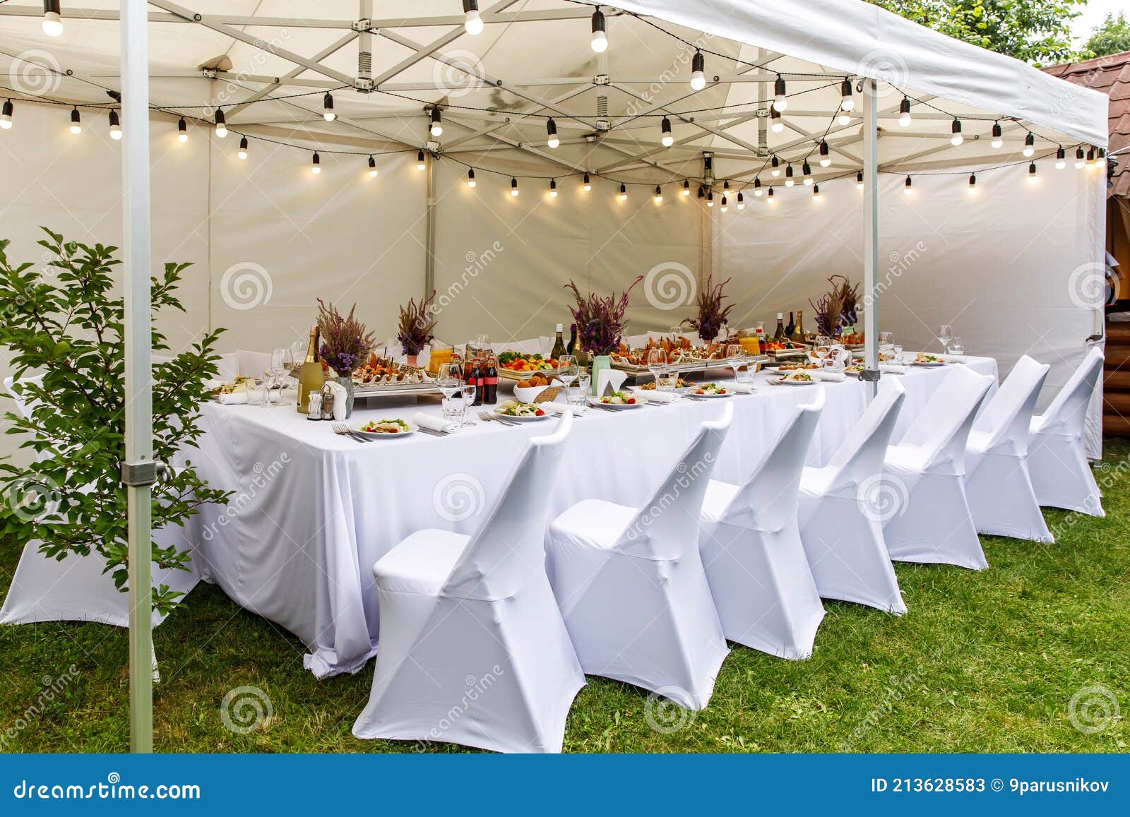 Wedding White Tent with White Chairs. Banquet Hall Under a Tent for ...