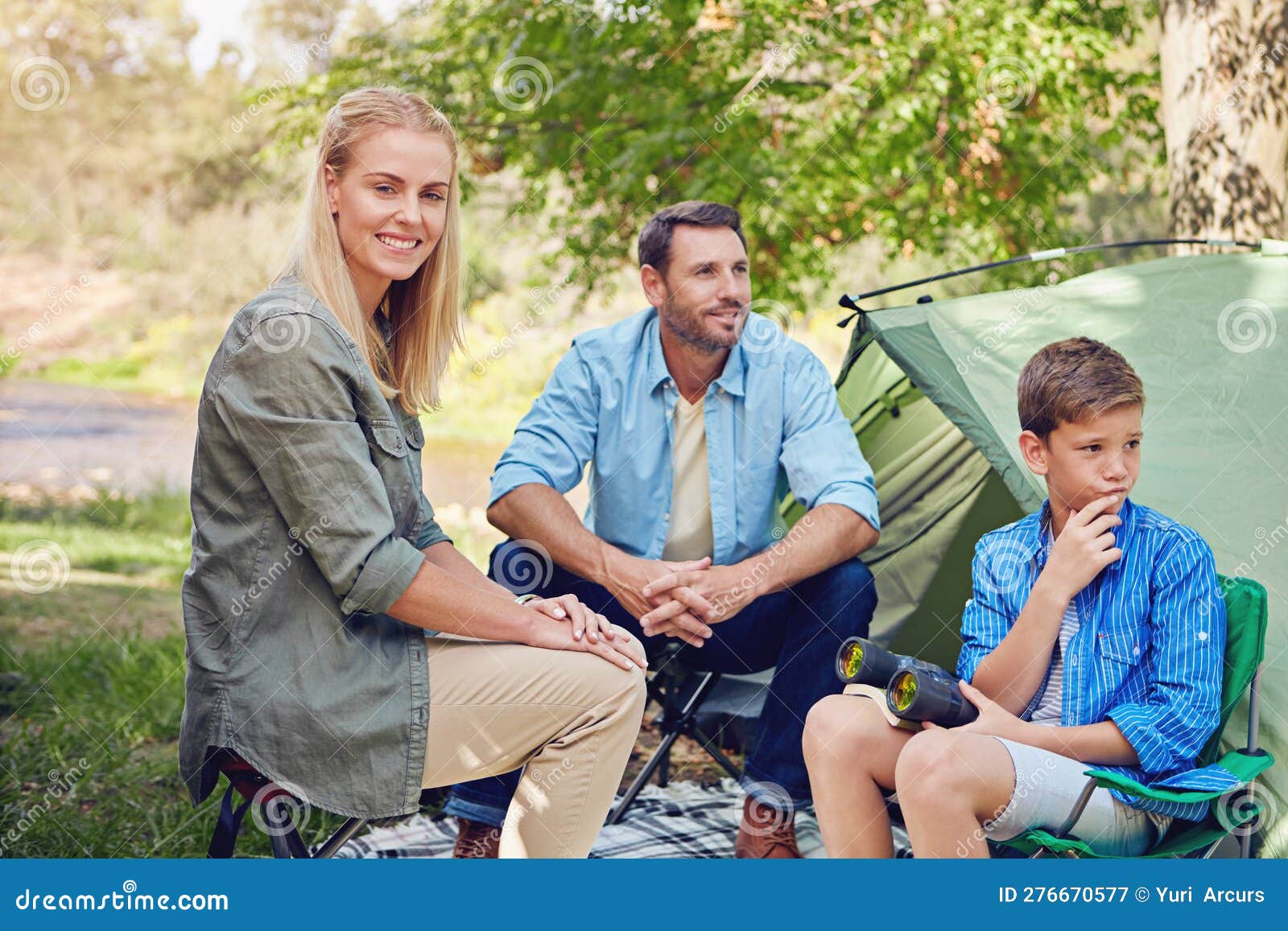 Weekend Camping. a Family of Three Camping in the Woods. Stock Image ...