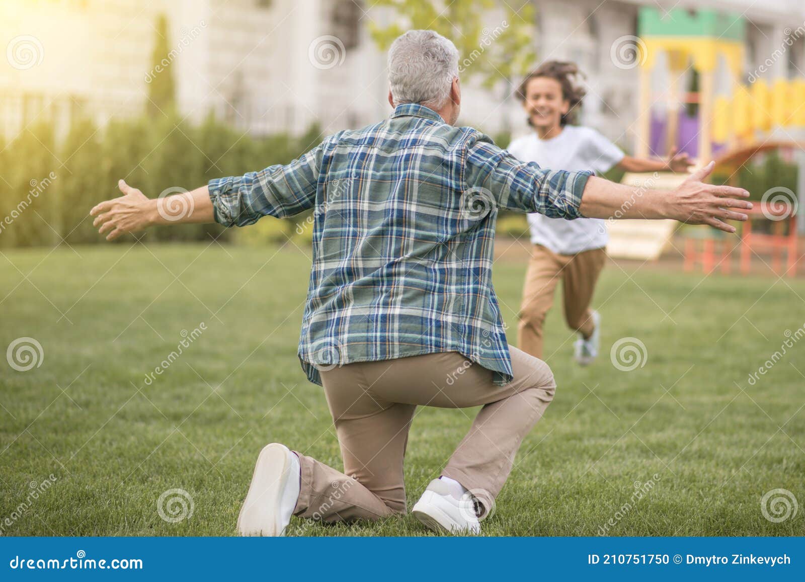 Boy Running To His Dad and Looking Happy Stock Photo - Image of ...