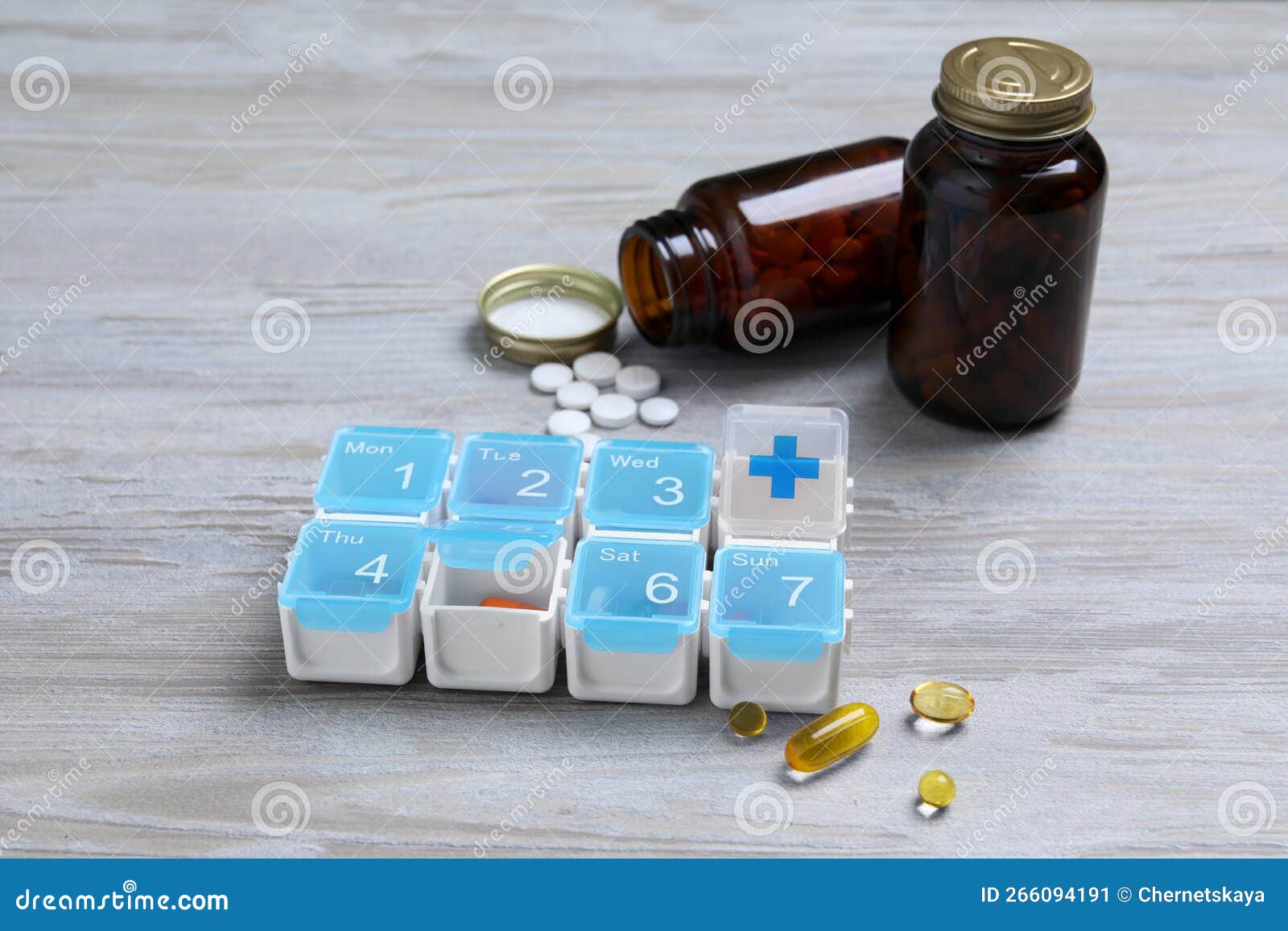 Weekly Pill Box with Medicaments on Wooden Table Stock Image - Image of ...