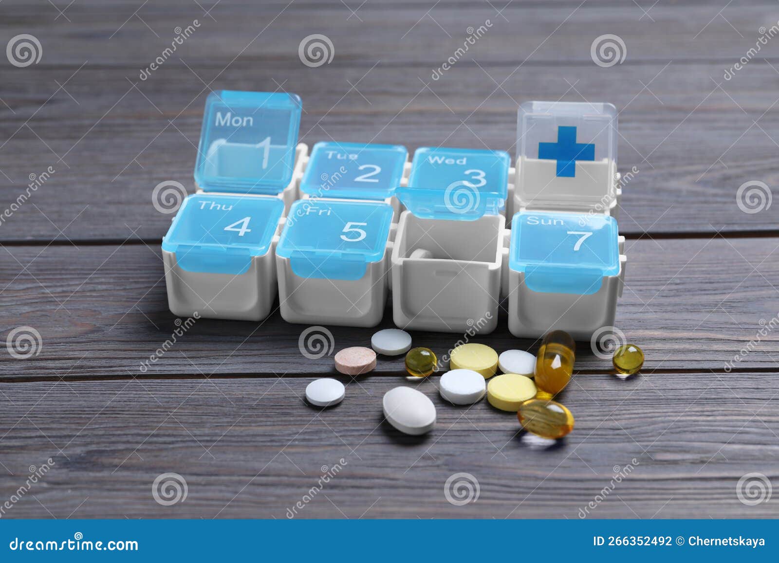 Weekly Pill Box with Medicaments on Wooden Table Stock Photo - Image of ...