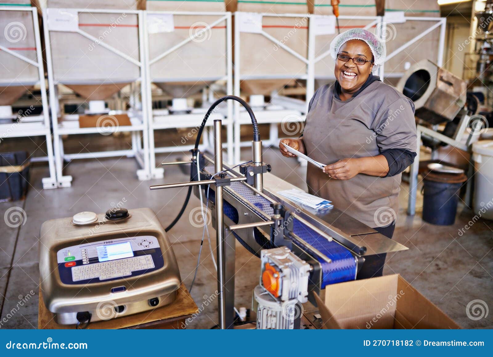 Weighed Up for Profit. Shot of a Factory Worker Using an Industrial ...