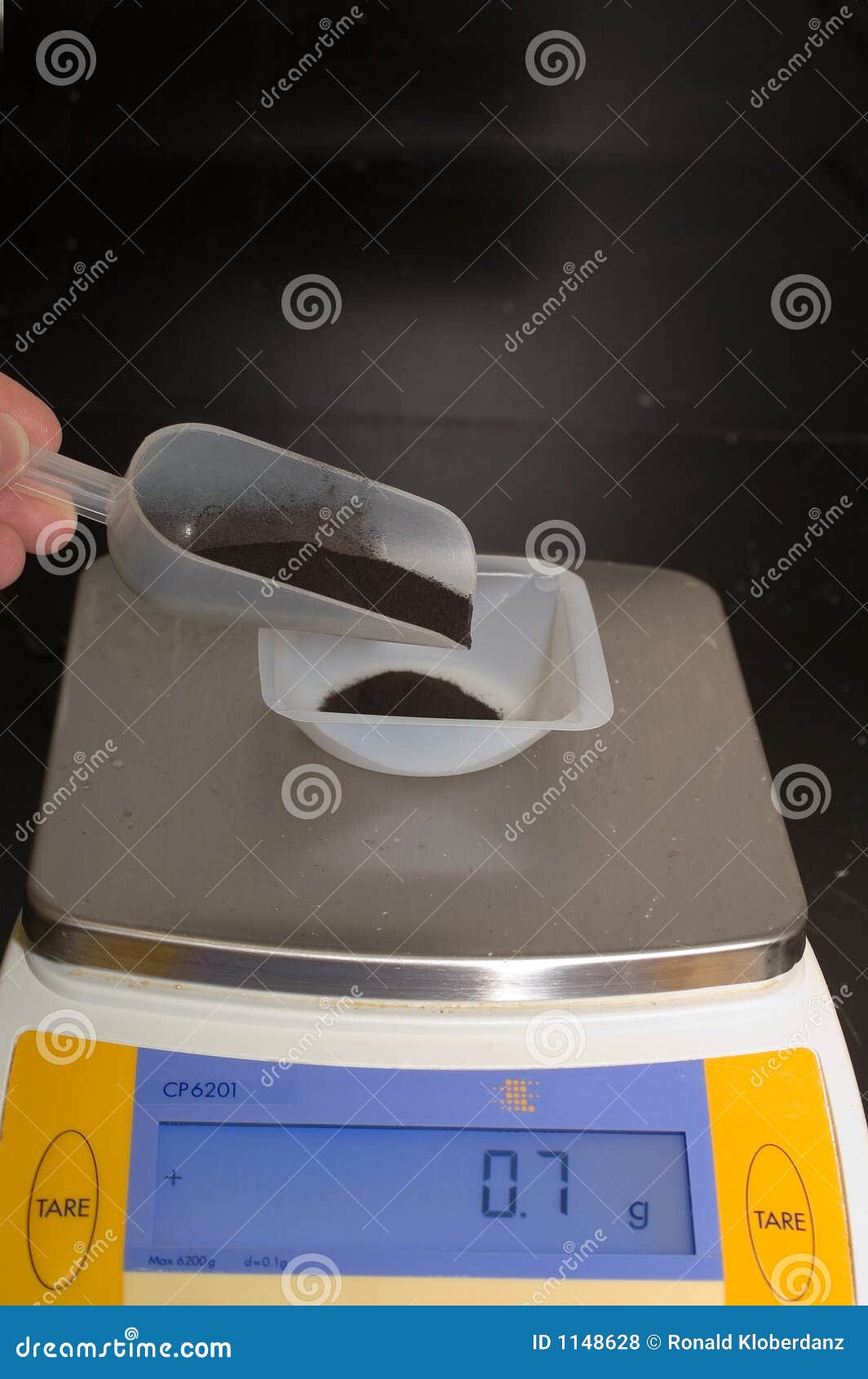Weighing dark powder stock photo. Image of light, spoon - 1148628