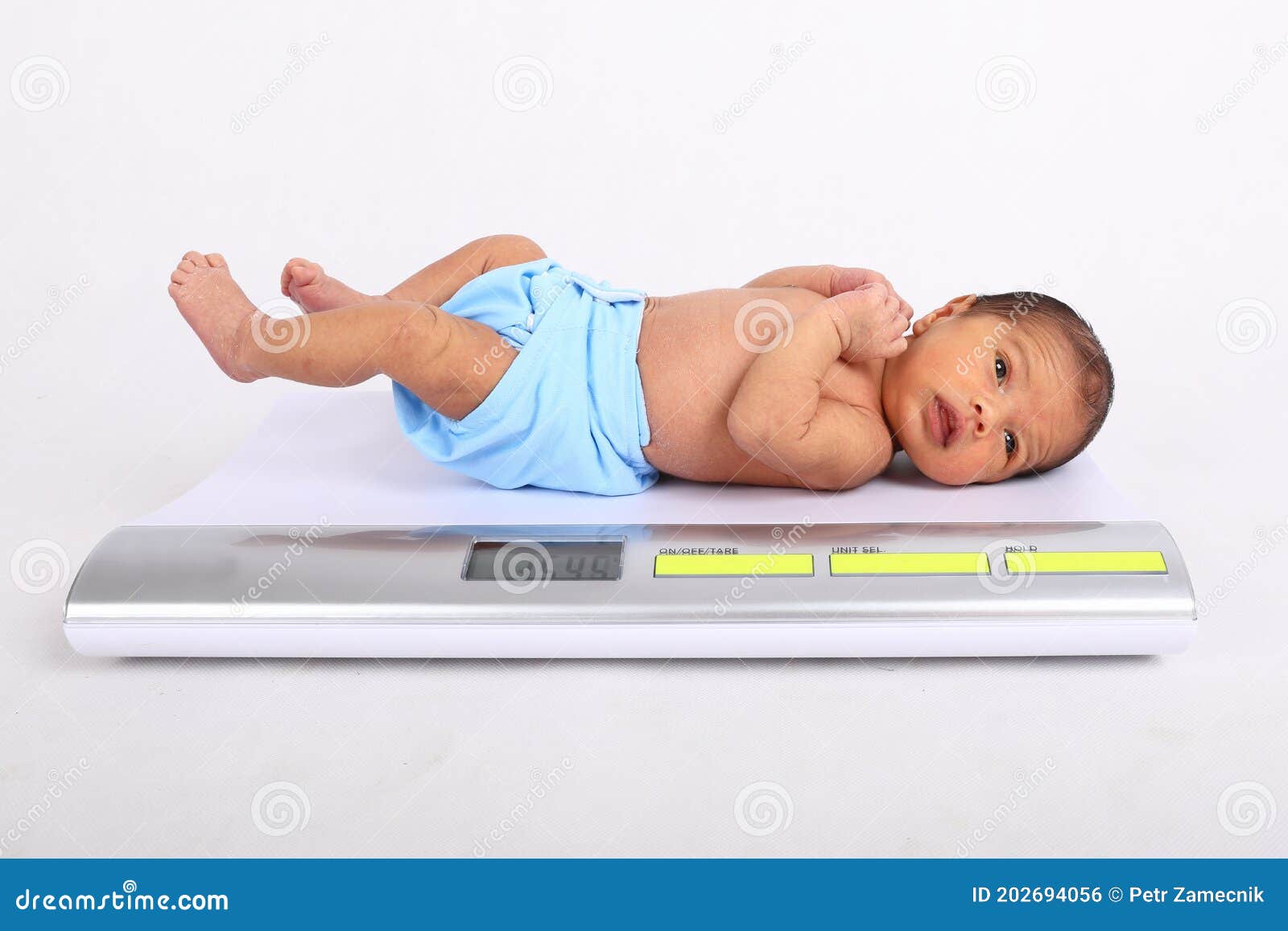 Weighing Newborn Baby Boy on Scale Stock Photo - Image of chilhood ... Weighing Newborn Baby Boy on Scale Stock Photo - Image of chilhood ...