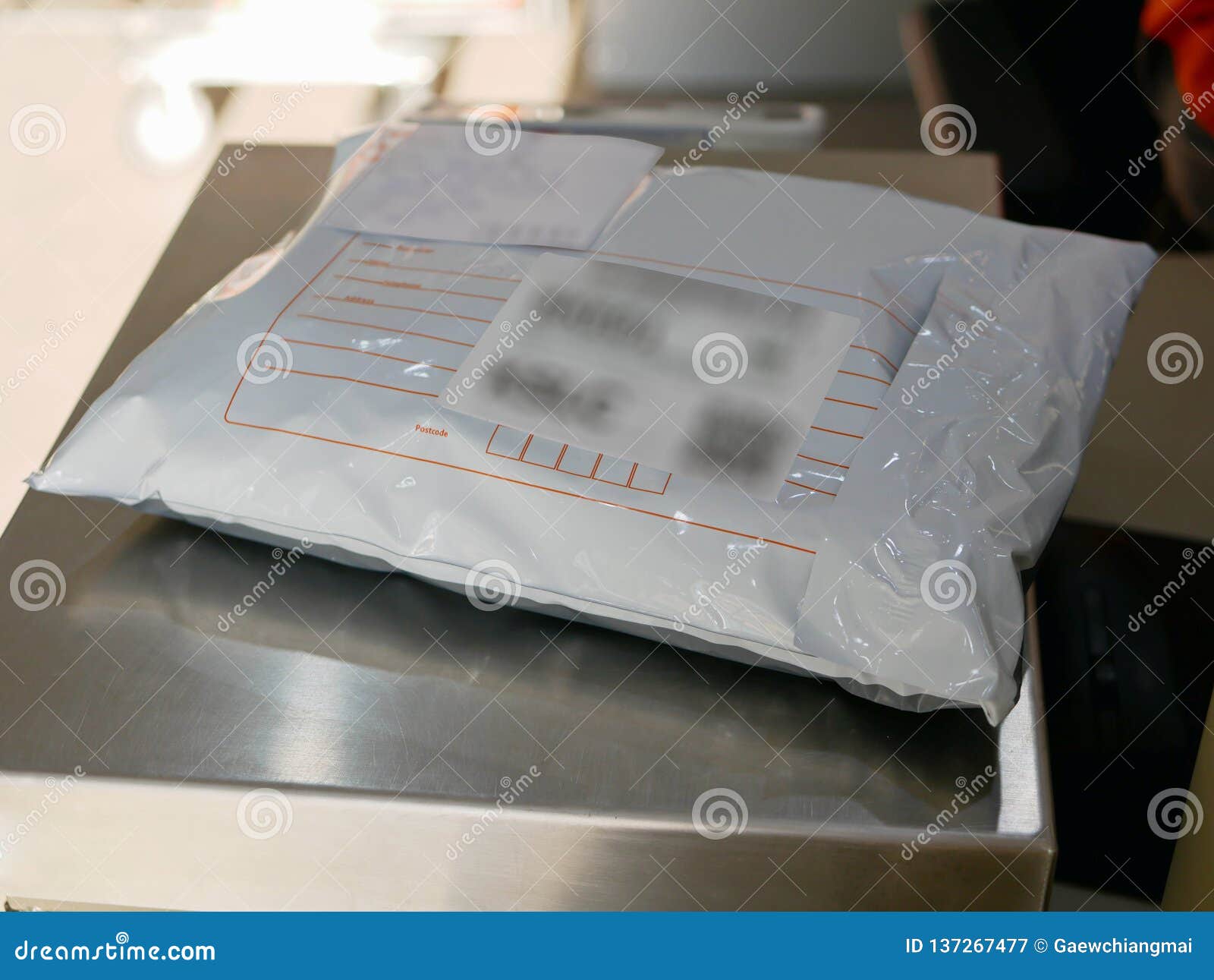 Weighing Parcel / Mail at a Private Postal Service Stock Image - Image ...