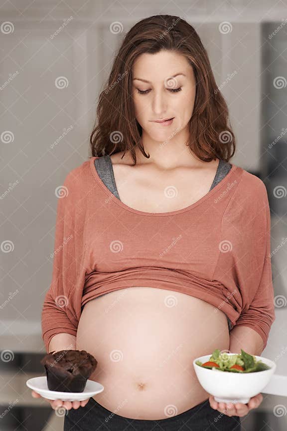 Weighing Up the Pros and Cons. a Young Pregnant Woman Deciding between ... Weighing Up the Pros and Cons. a Young Pregnant Woman Deciding between ...