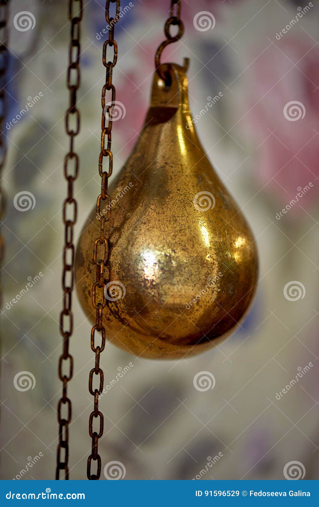 The Weight or Load on Old Retro Clock on a Chain.Close. Metal or Bronze ...