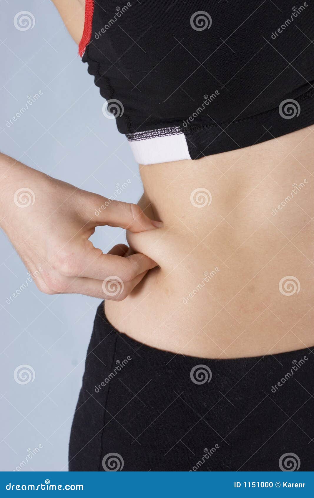 Weight loss -pinch an inch stock photo. Image of belly - 1151000