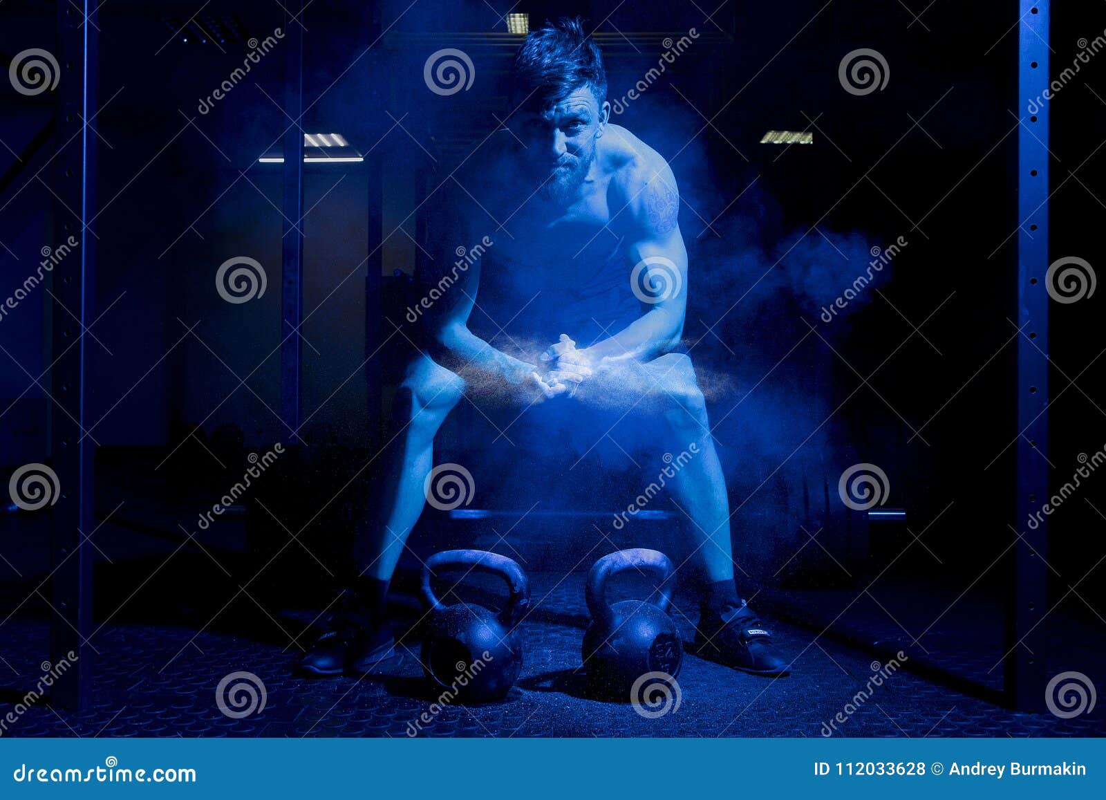 Weightlifter Clapping Hands and Preparing for Workout at a Gym Stock ...