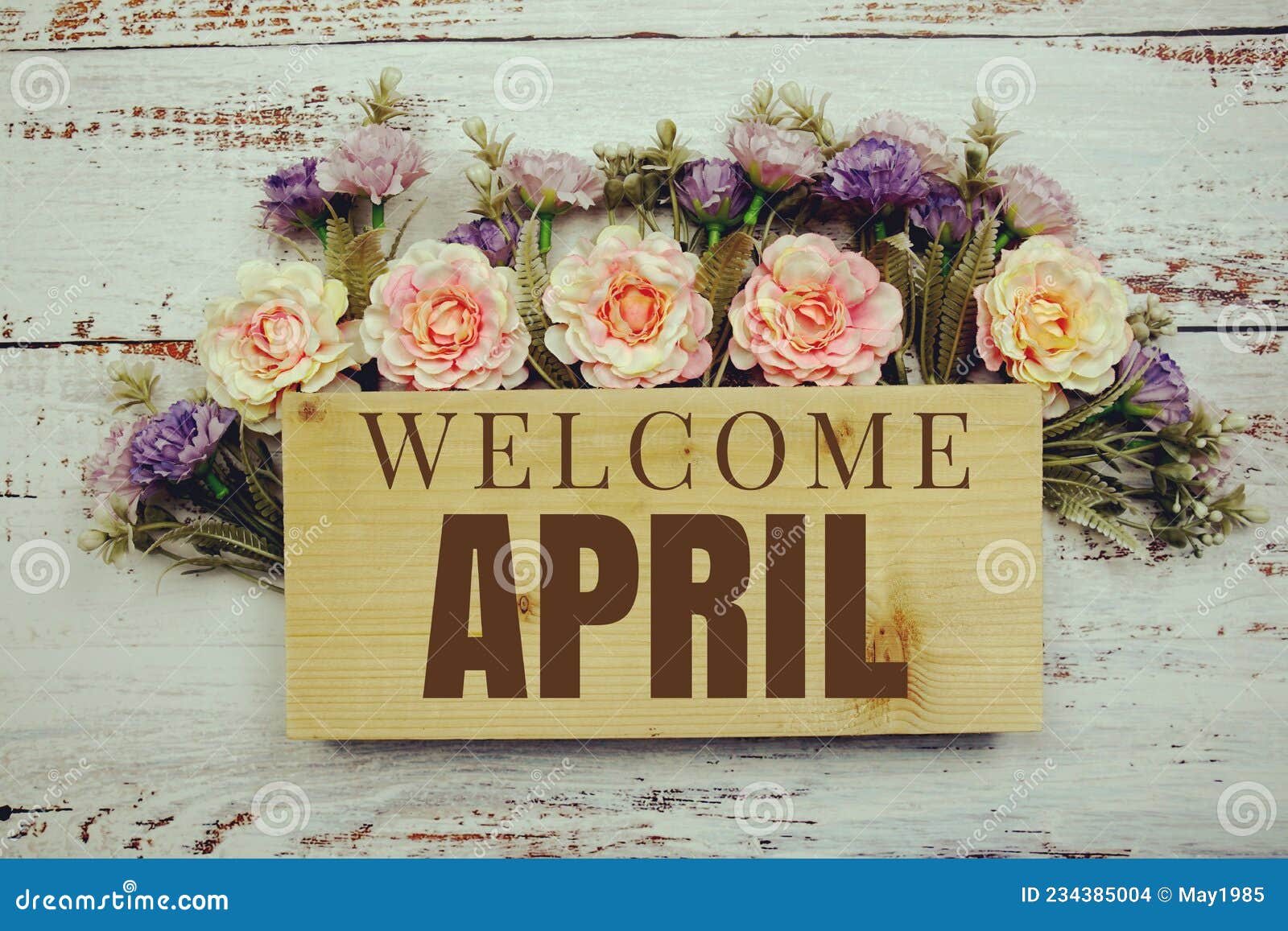 Welcome April Text on Wooden Board with Flowers Frame on Wooden ...