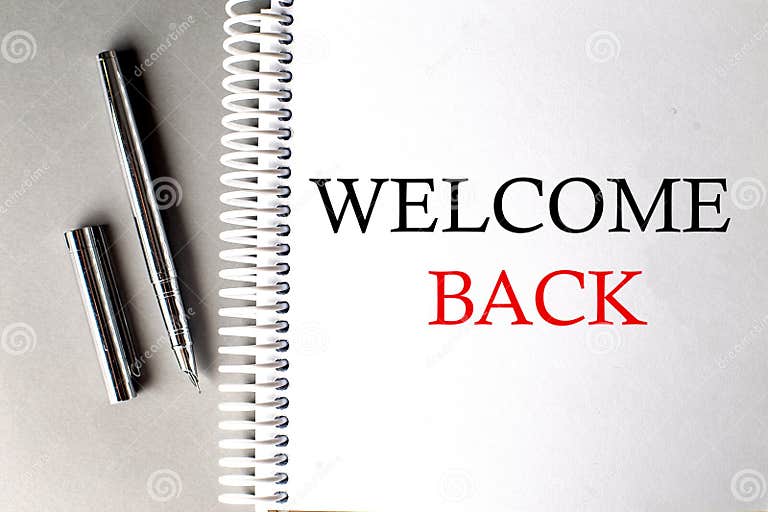 WELCOME BACK Text on a Notebook with Pen on Grey Background Stock Image ...