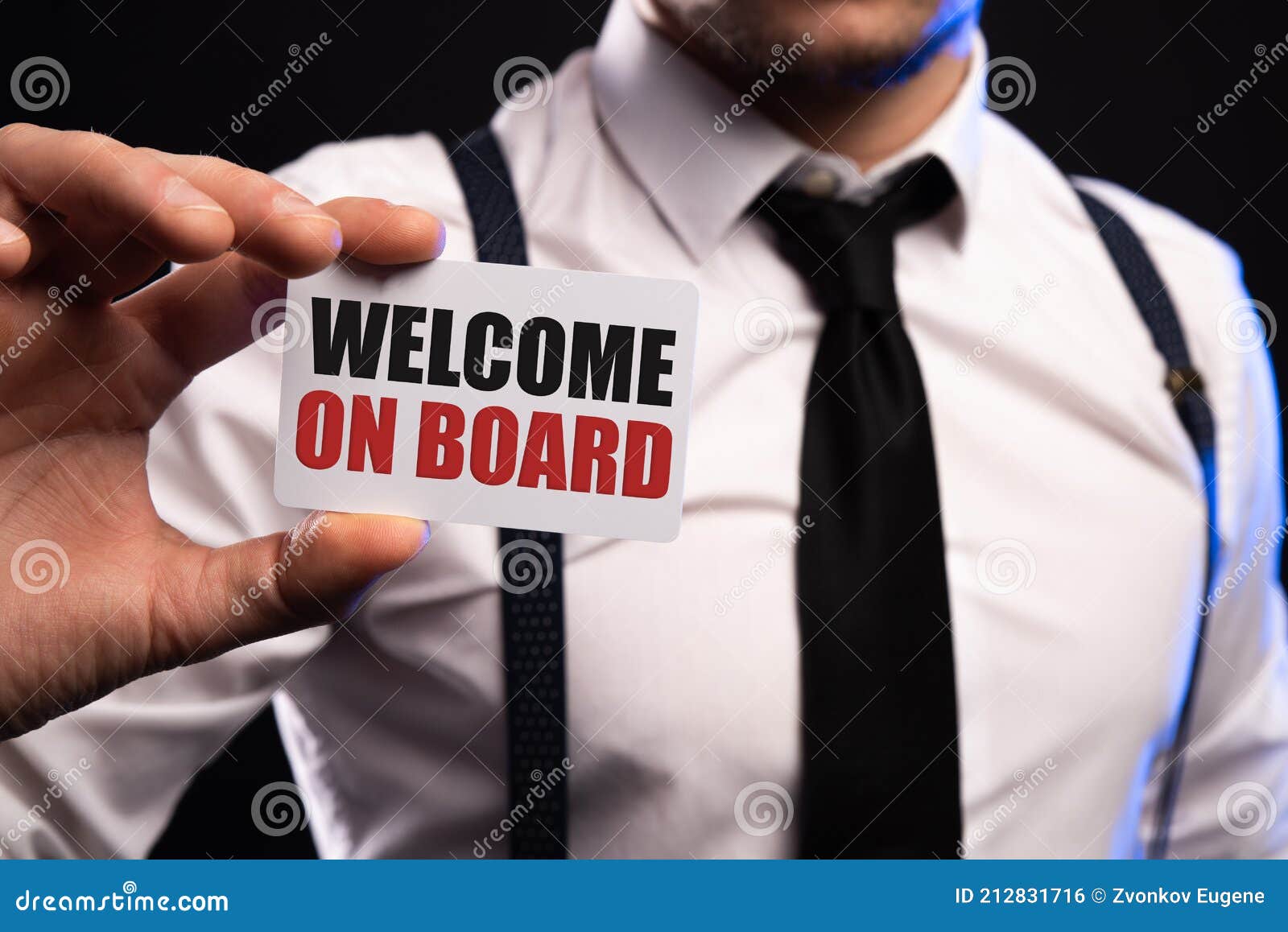 Welcome on Board - Businessman Holding White Sign with Text in the ... Welcome on Board - Businessman Holding White Sign with Text in the ...