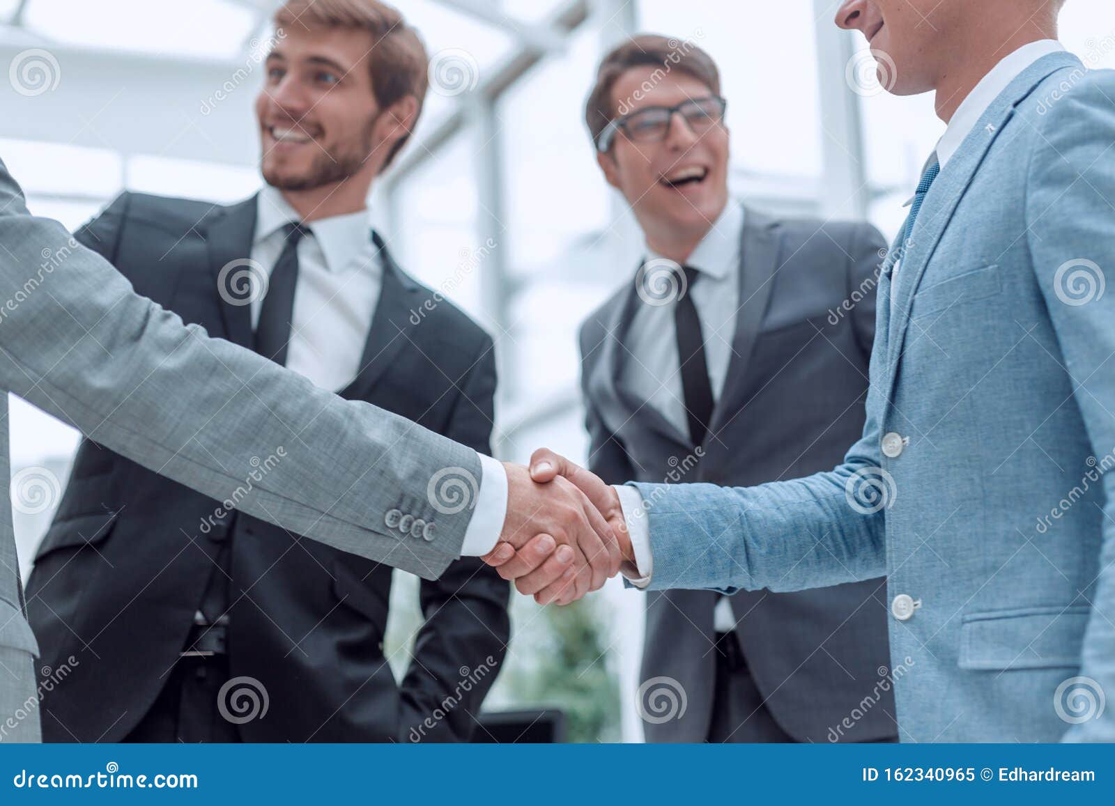 Welcome Handshake of Business People in the Office Stock Image - Image ...