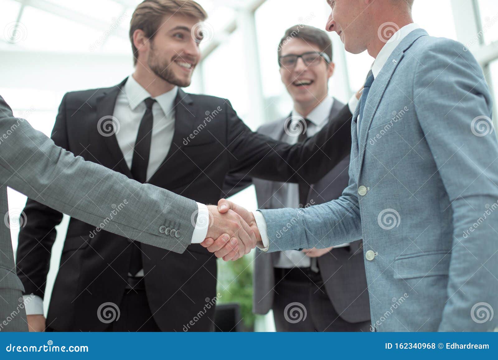 Welcome Handshake of Business People in the Office Stock Photo - Image ...