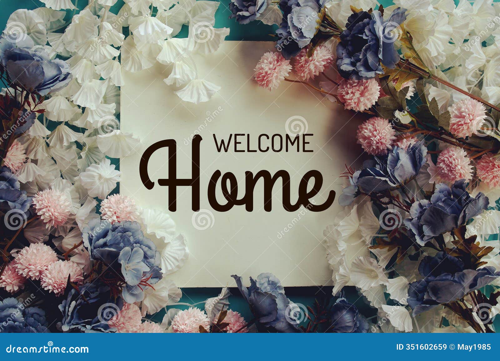 Welcome Home Text with Flowers Frame Decoration Top View on Blue ...