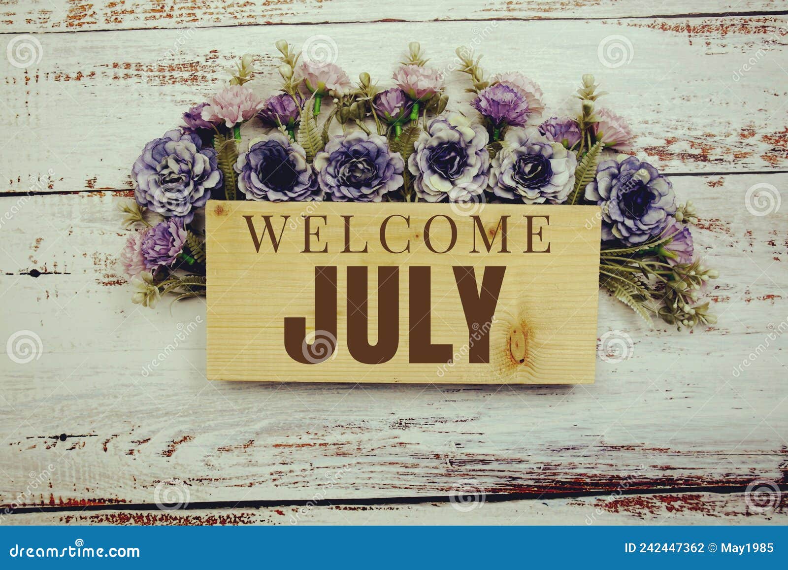 Welcome July Text on Wooden Board with Flowers Frame on Wooden ...