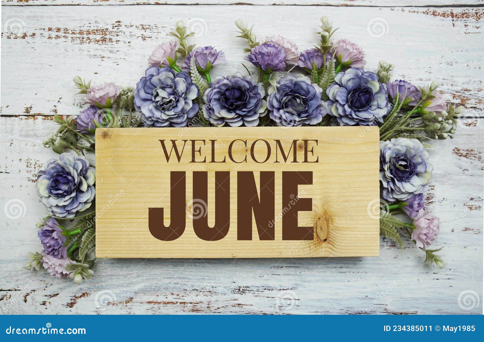 Welcome June Text on Wooden Board with Flowers Frame on Wooden ...