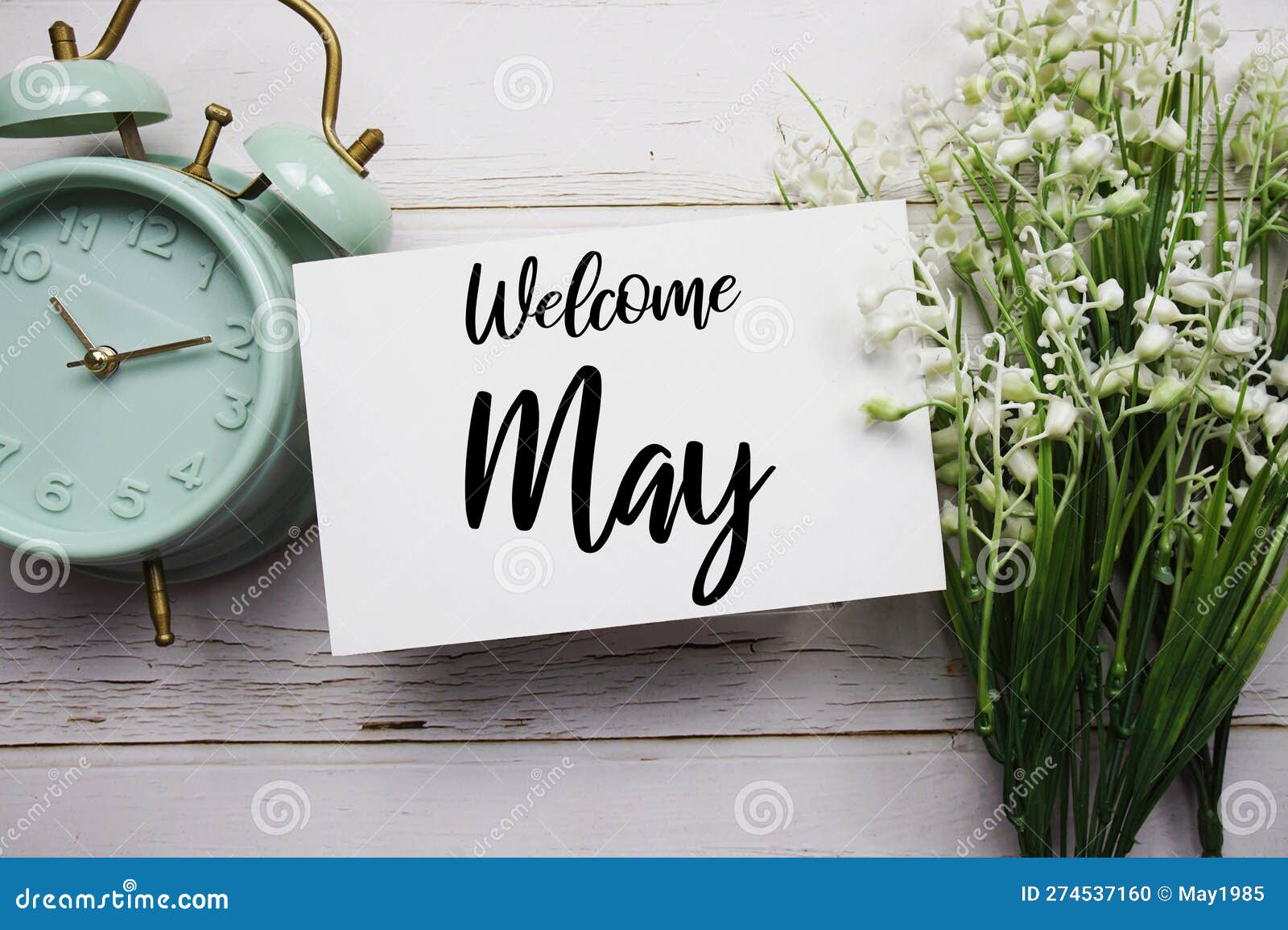 Welcome May Text Message with Flower Decoration on Wooden Background ...