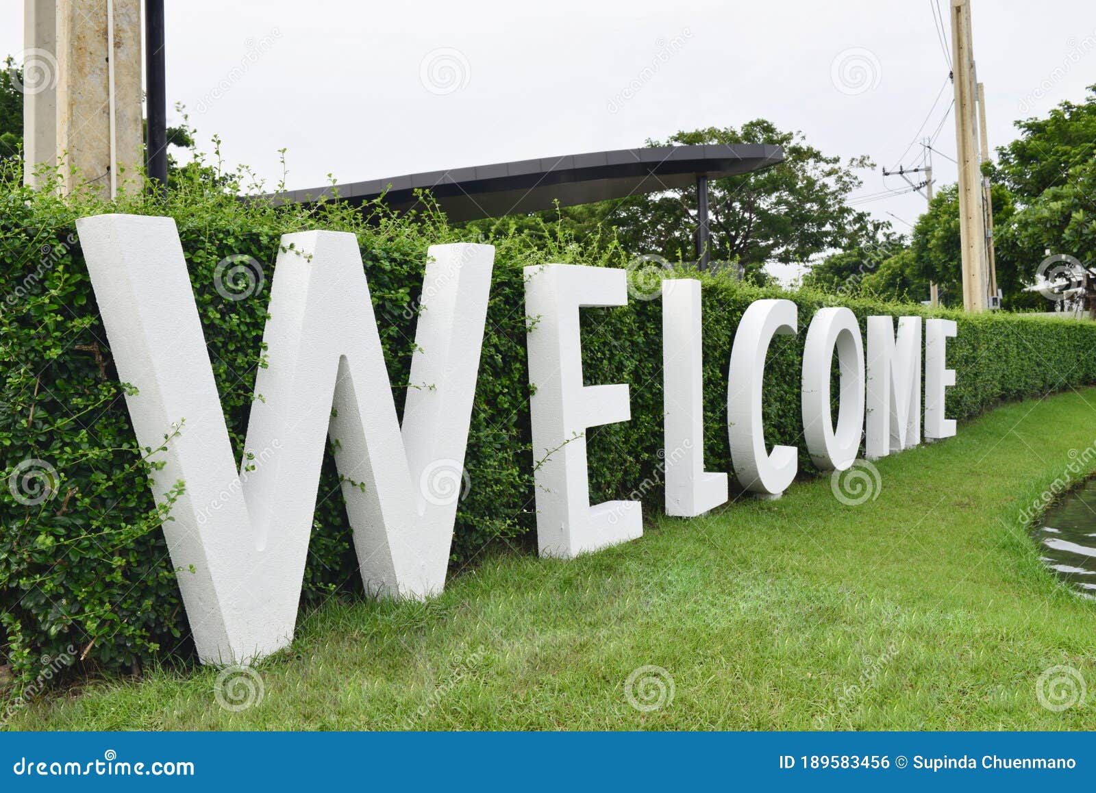 Welcome Message Label on Grass Background Stock Photo - Image of ...