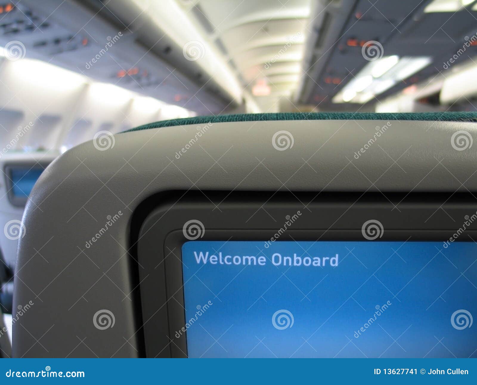 Welcome Message on Screen in Airplane Interior Stock Image - Image of ...