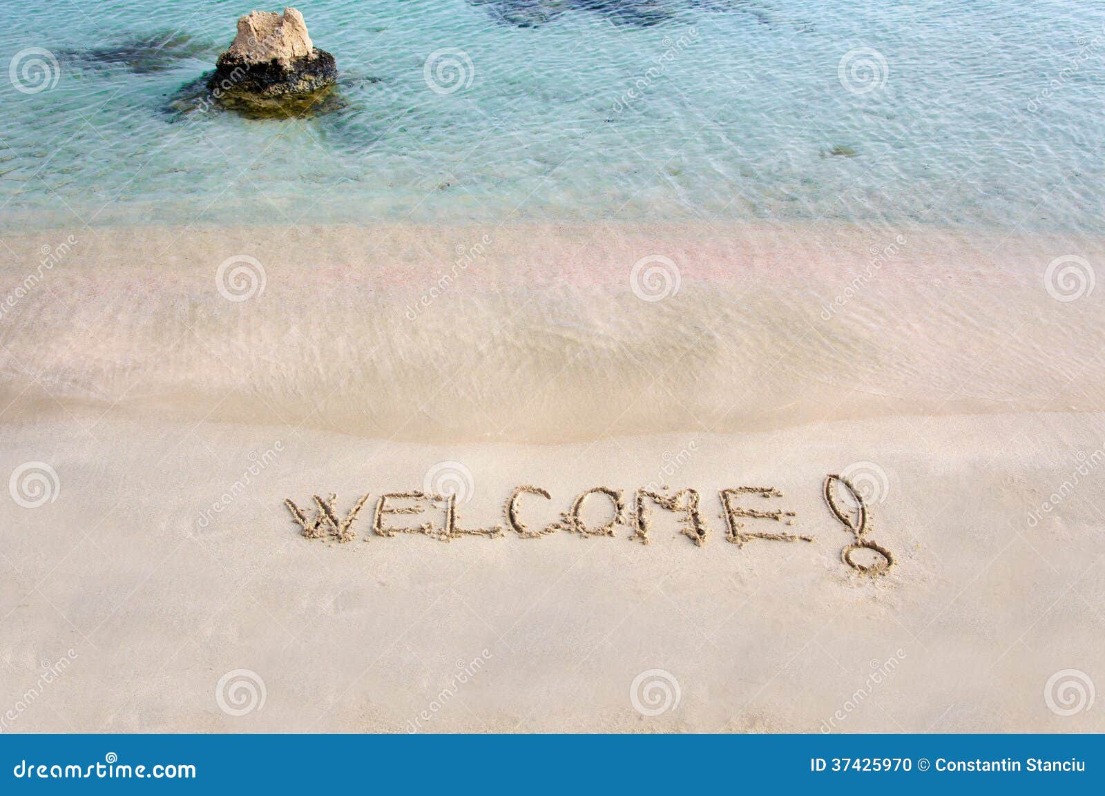 Welcome Message Written on White Sand, with Tropical Sea Waves in ...