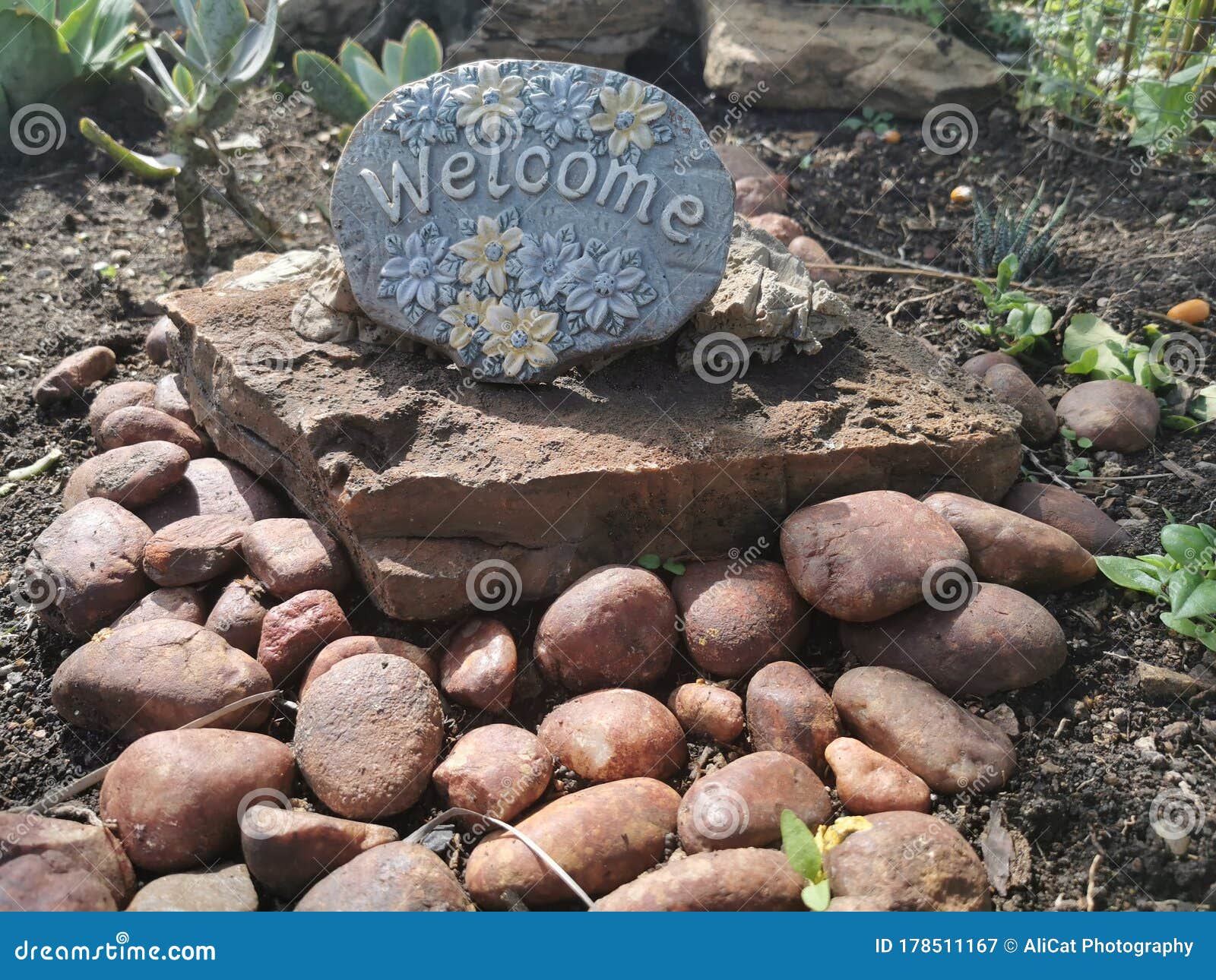 Welcome organic garden stock image. Image of rocks, unedited - 178511167