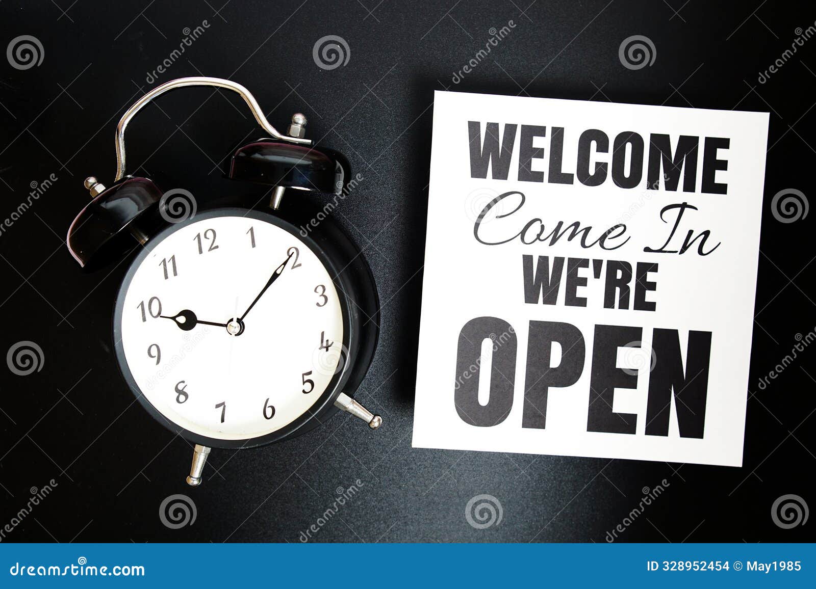 Welcome we Re Open Text with Alarm Clock on Black Background Stock ...