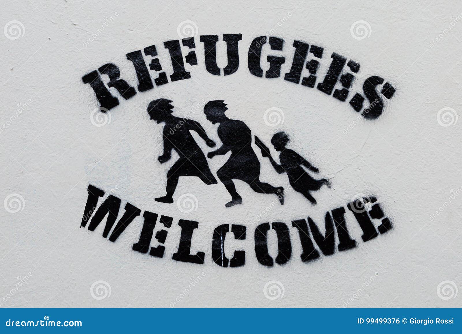 Welcome Refugees Text Stencil Print on White Wall Stock Photo - Image ...