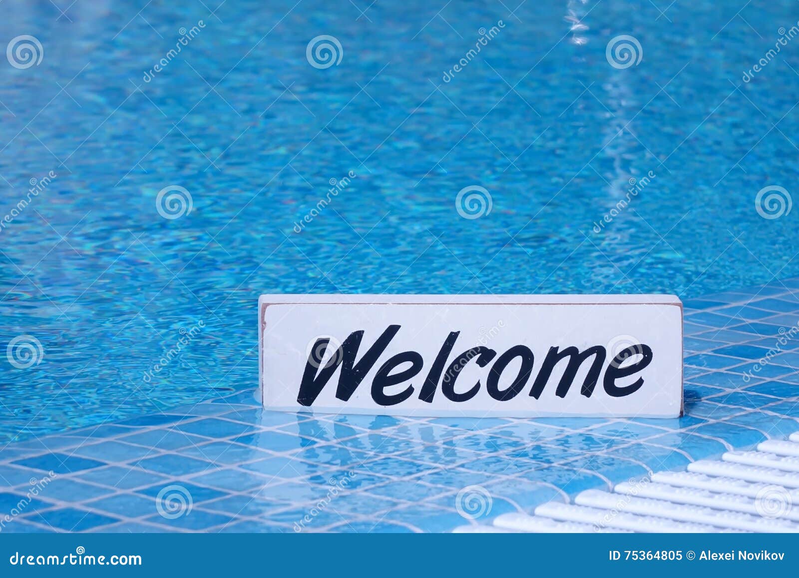 Welcome Sign and Empty Swimming Pool Surface in the Background Stock ...