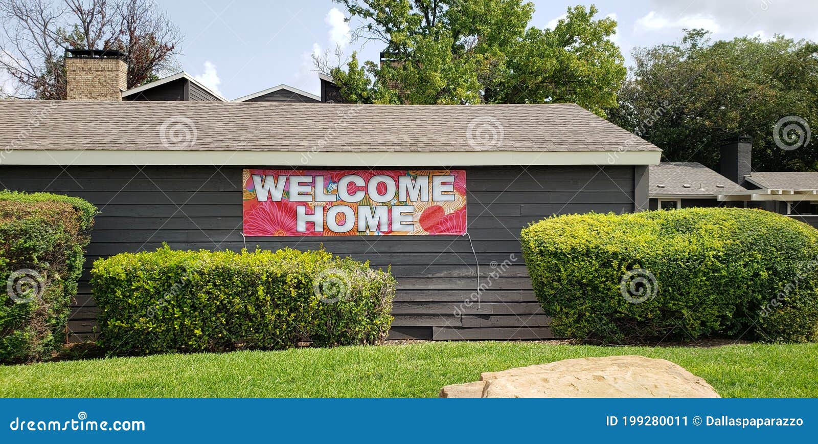 Welcome Sign Hangs on Garage Stock Image - Image of happy, sign: 199280011