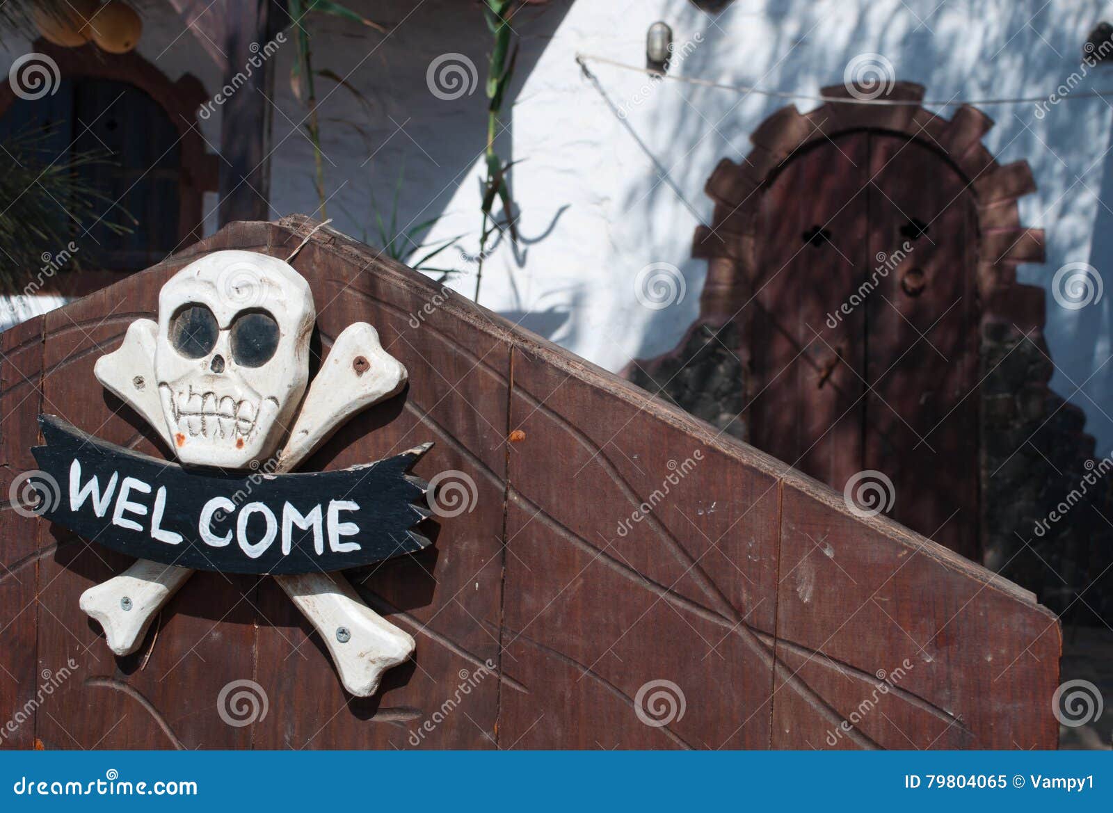 A Welcome Sign in the Shape of a Skull with Crossbones Stock Image ...
