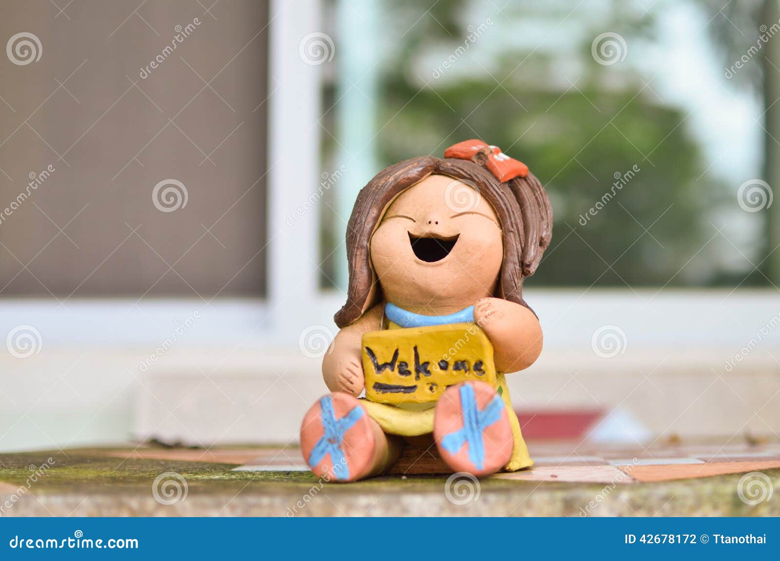 Welcome Sign Stone Doll on the Table Stock Photo - Image of pink, color ...