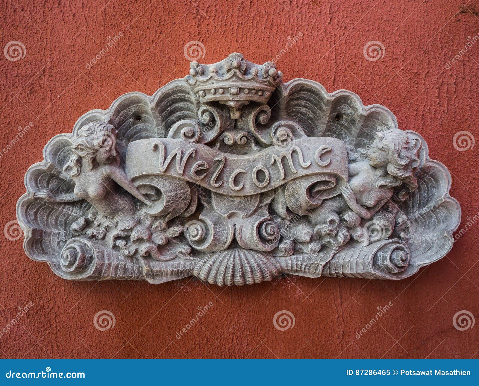 Welcome sign stone on wall stock image. Image of wall - 87286465