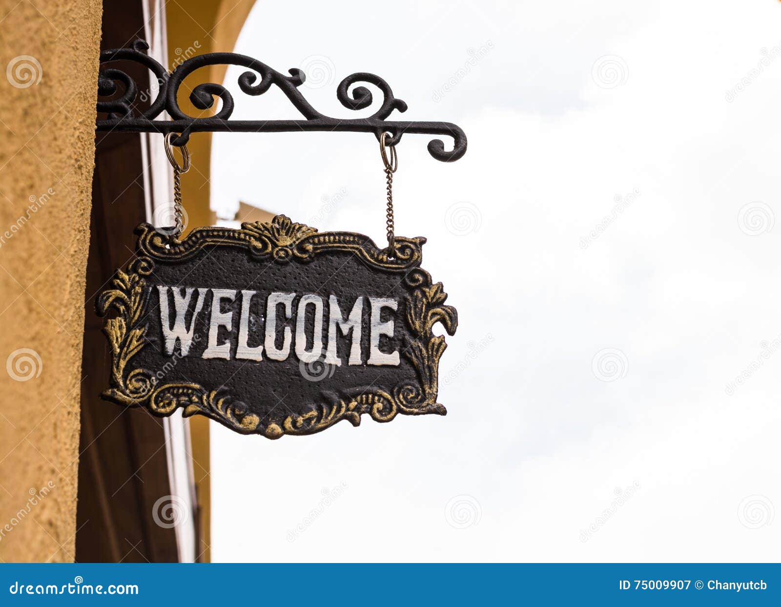 Welcome Wooden Sign Board with Rope Hanging in Front of the Gate Stock ...