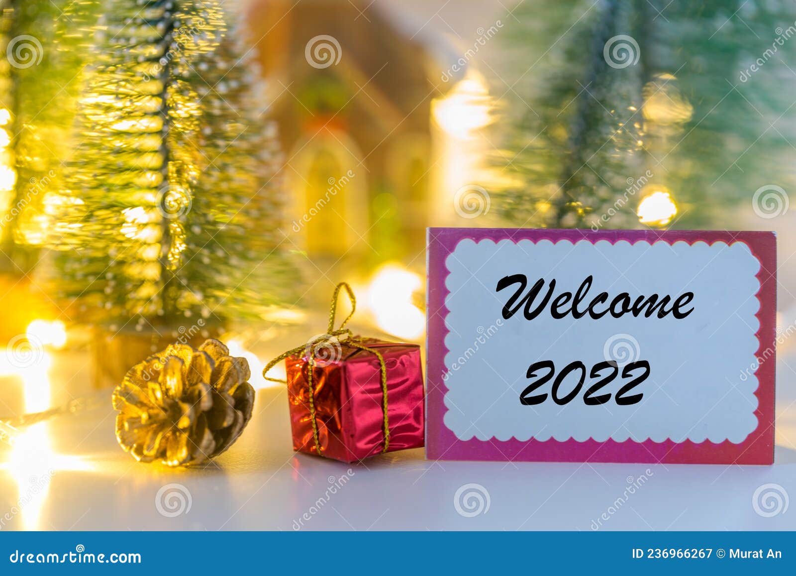 Welcome 2022 Writing on Greeting Card with Small House and Lights ...